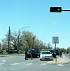 Two charged in road rage incident, one still at large